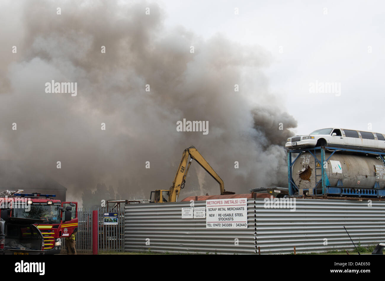 Grimsby, Lincolnshire, UK. 11th July, 2013. Fire at recycling centre ...