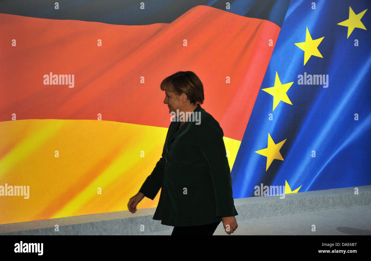 CDU federal chairwoman and Chancellor Angela Merkel walks past a German ...