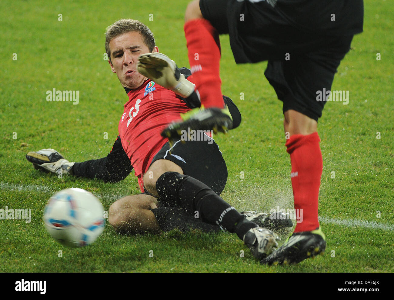 The attack by Berlin's Christopher Quiring (L) deflected by Azerbaijan ...