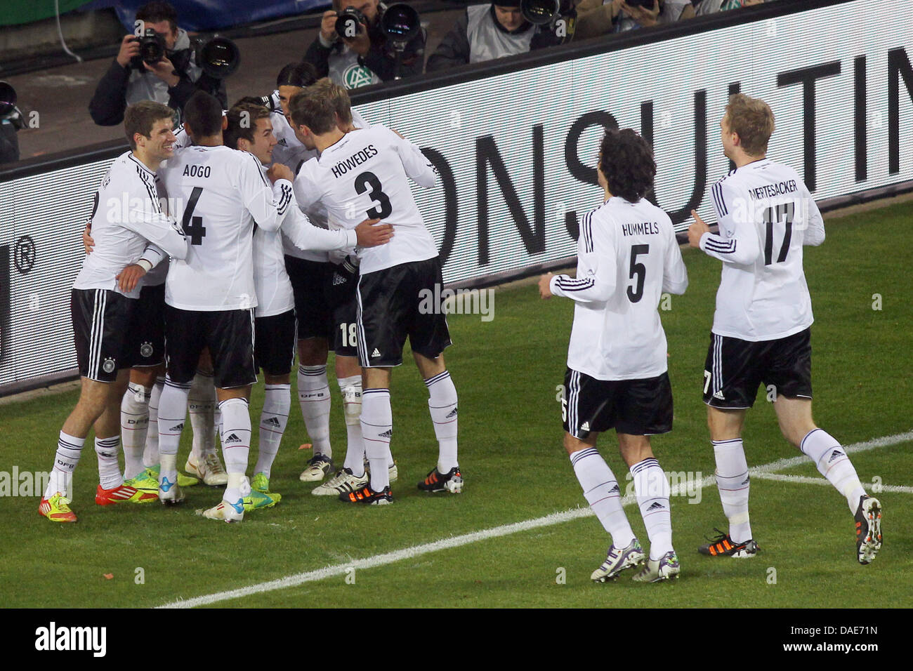 Germany's team celebrates after scoring 3-0 goal during the ...