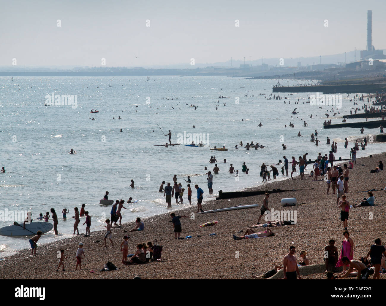 A crowded Brighton beach on a summer's day Stock Photo - Alamy