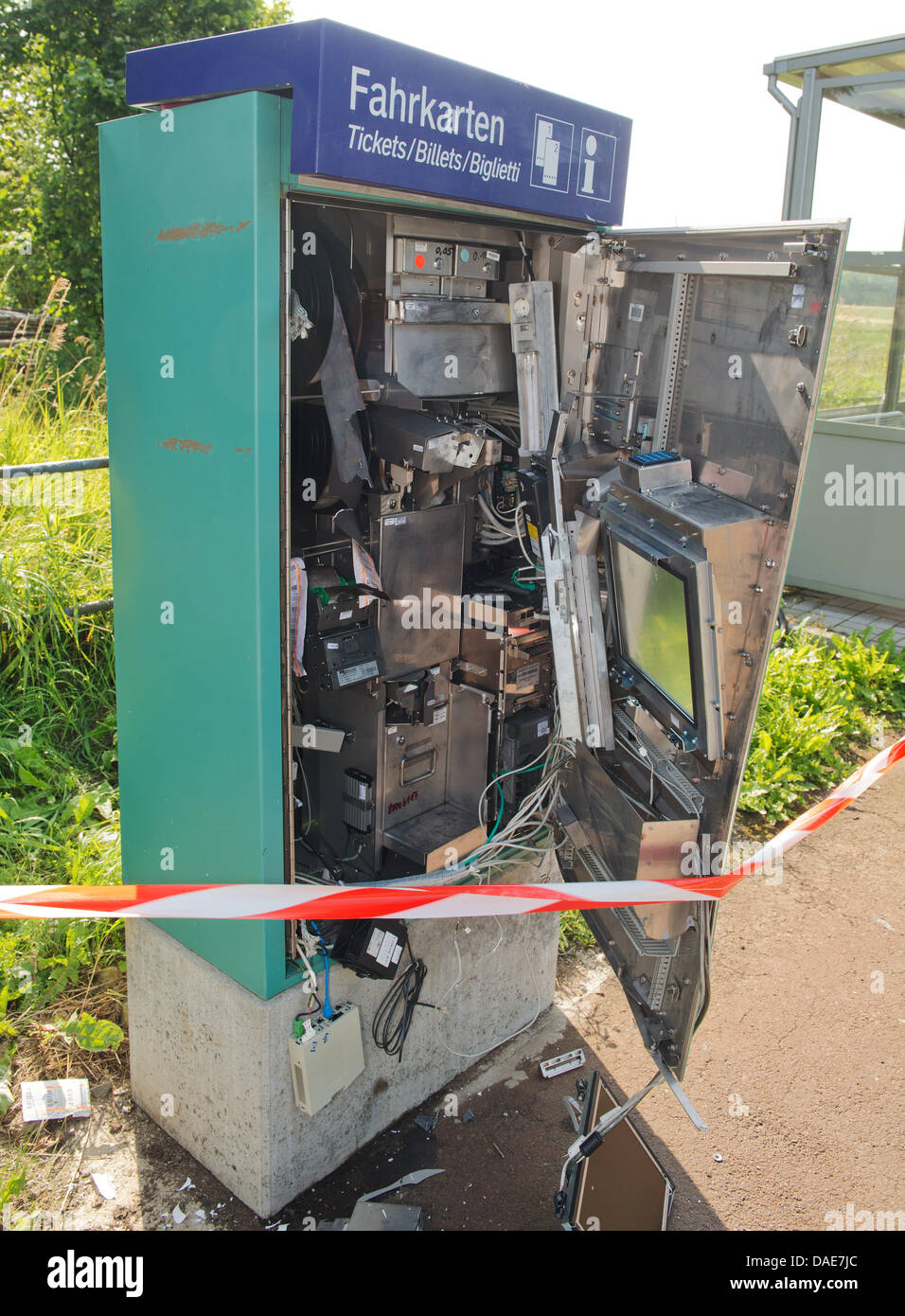 A fully destroyed ticket vending machine is pictured on a platform in ...