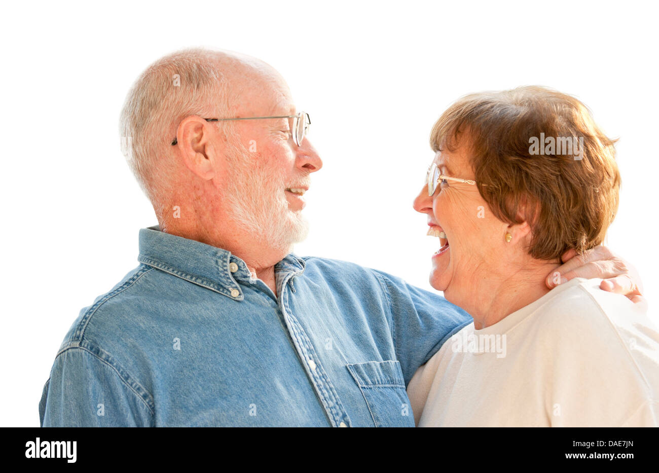 Affectionate Happy Senior Couple Laughing Together Isolated On White