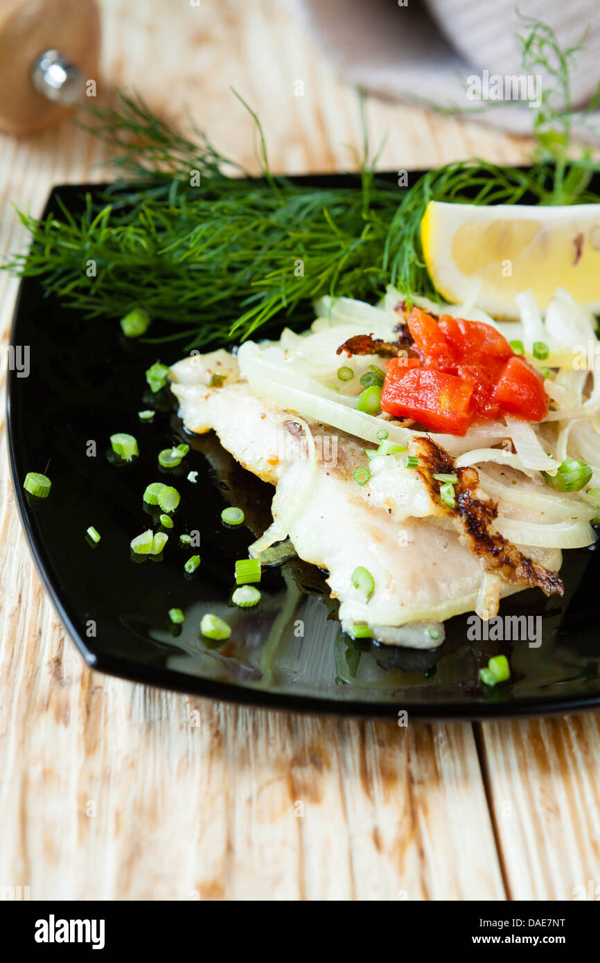 roasted lemon sole on plate, food close up Stock Photo - Alamy