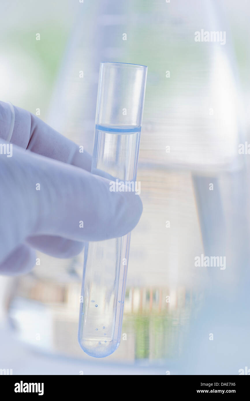 Researcher holding test tube hi-res stock photography and images - Alamy