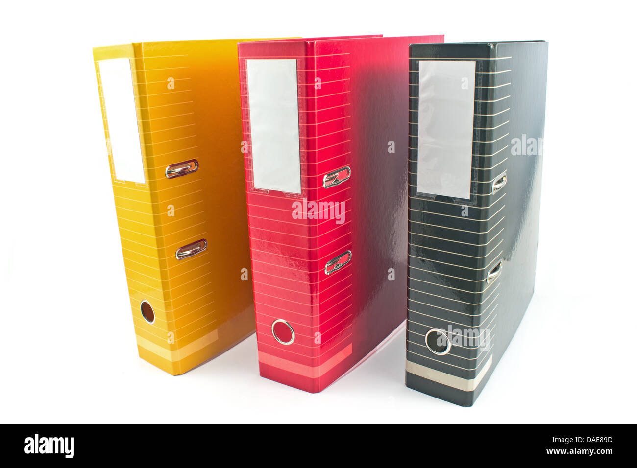 Three colorful office folders isolated on white Stock Photo - Alamy
