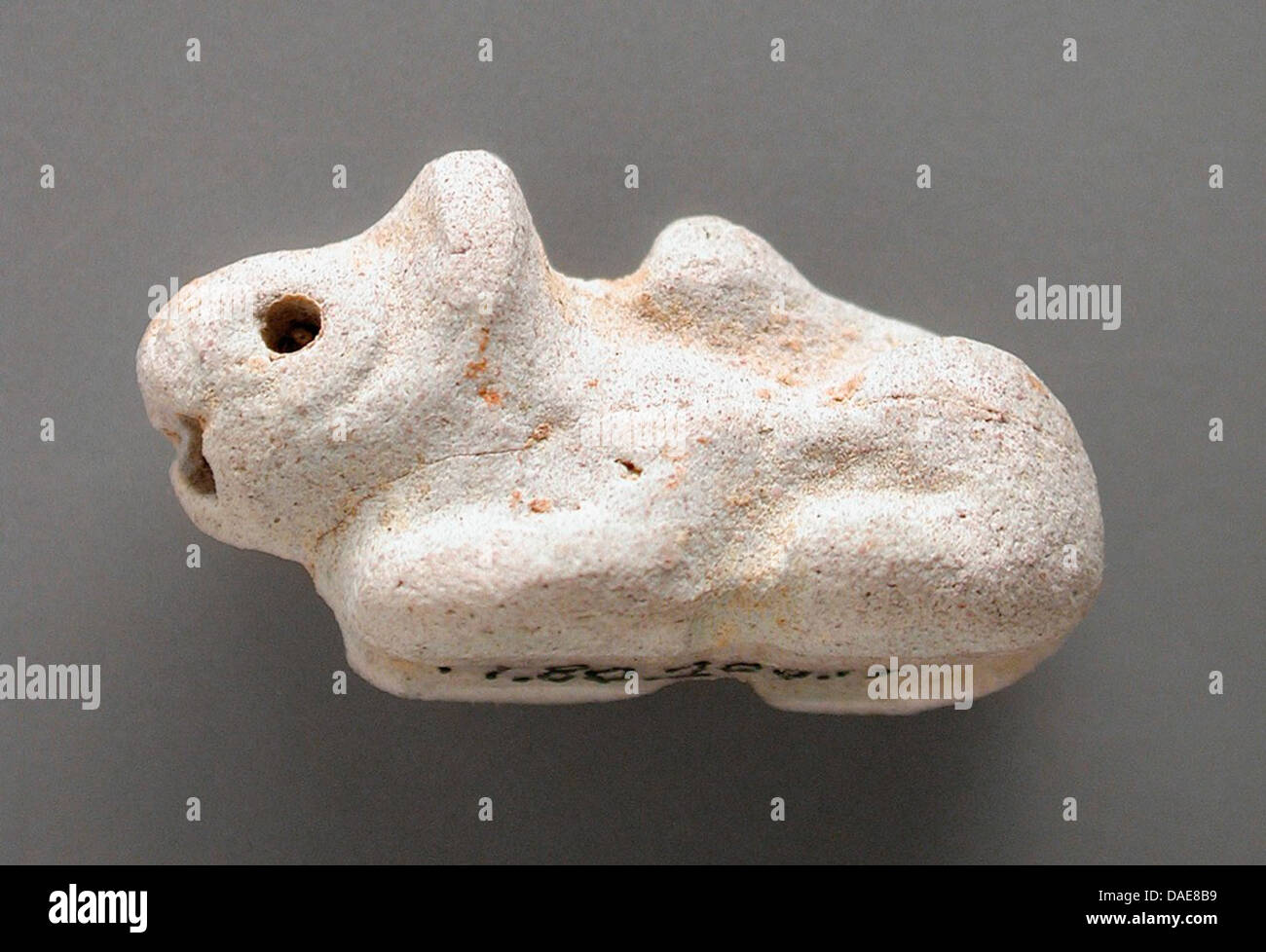 This amulet features a seated cat, a symbol of protection and grace ...