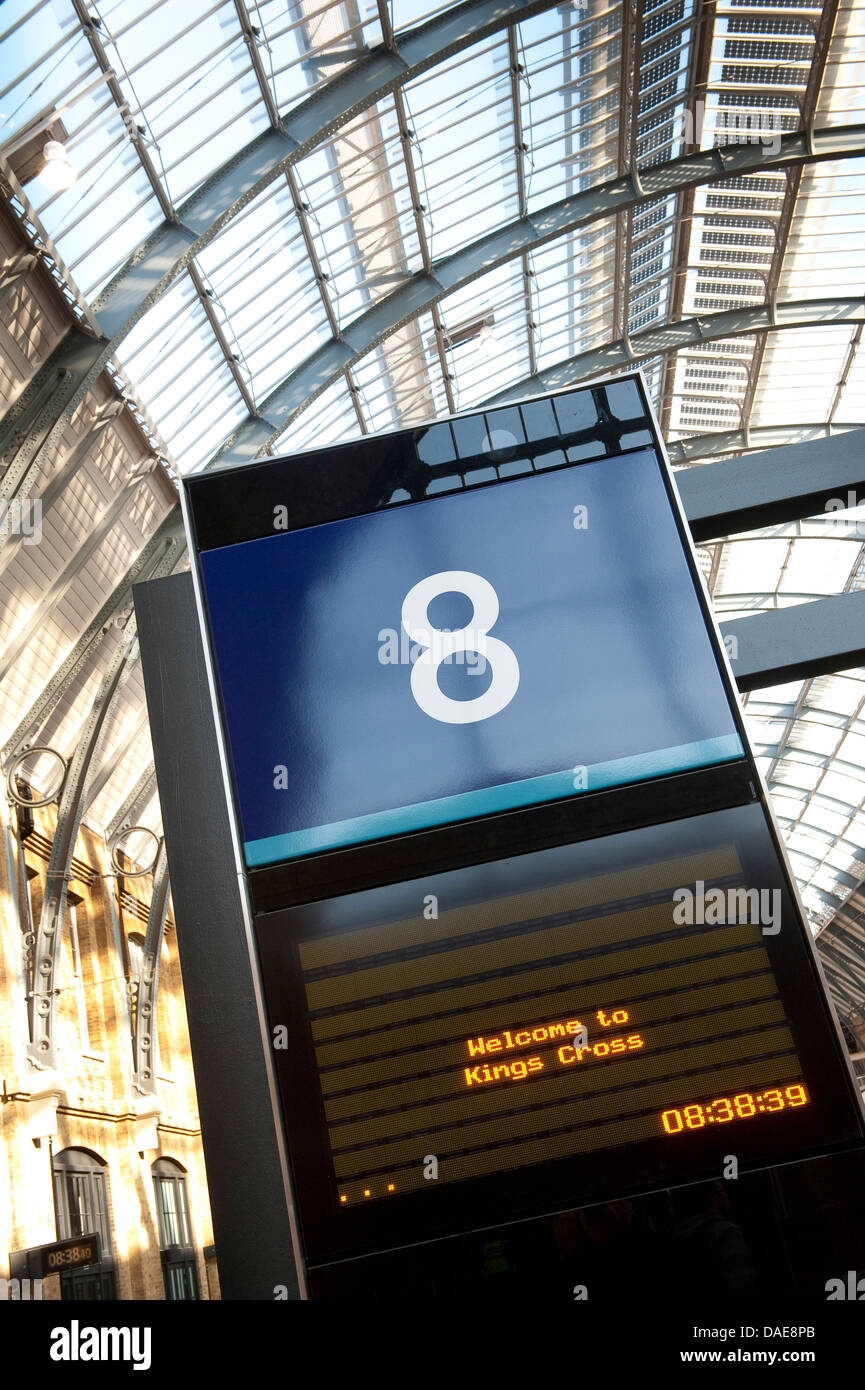 Platform number sign and information screen at Kings Cross Railway ...