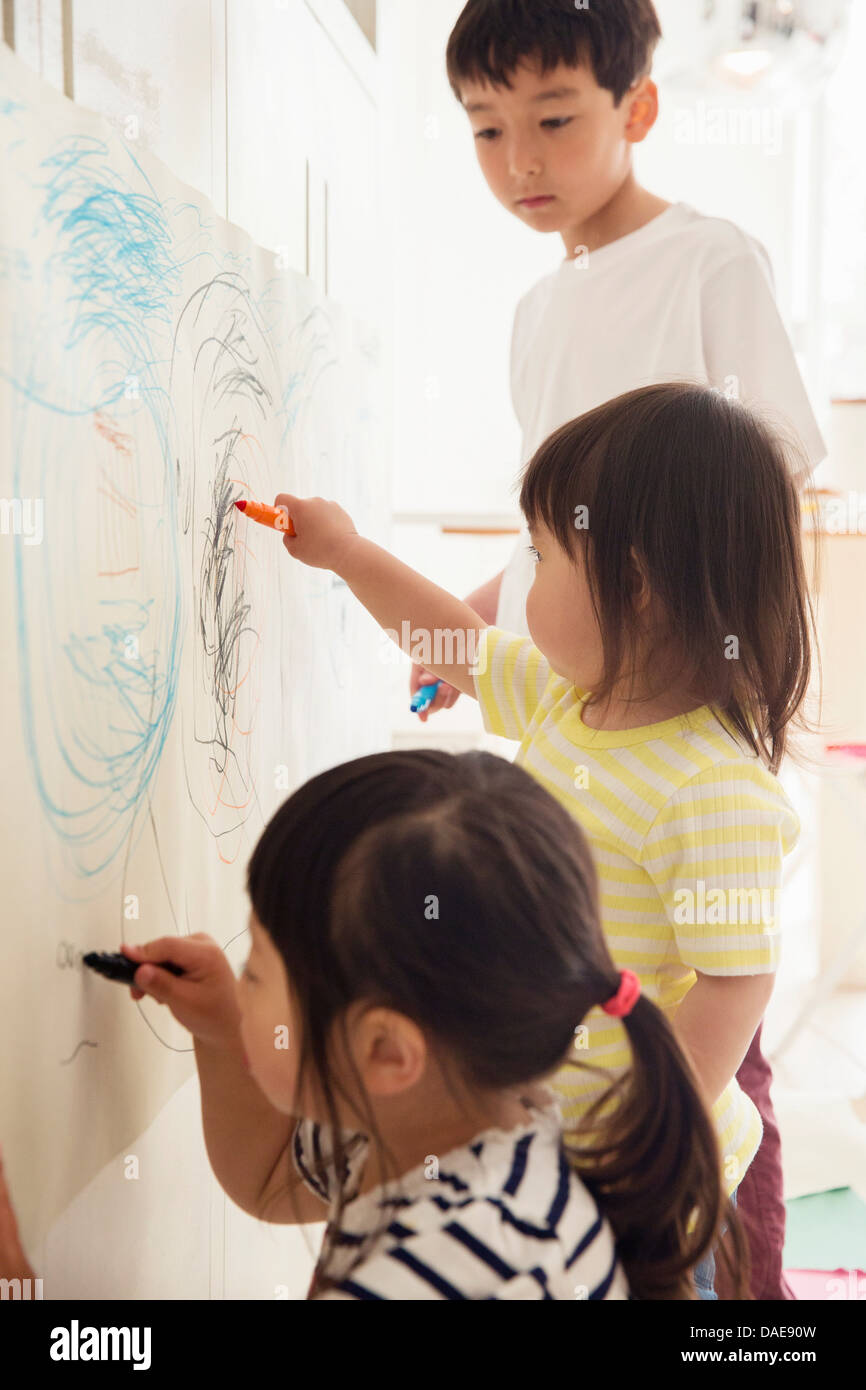 Brother and sister watching teaching hi-res stock photography and ...