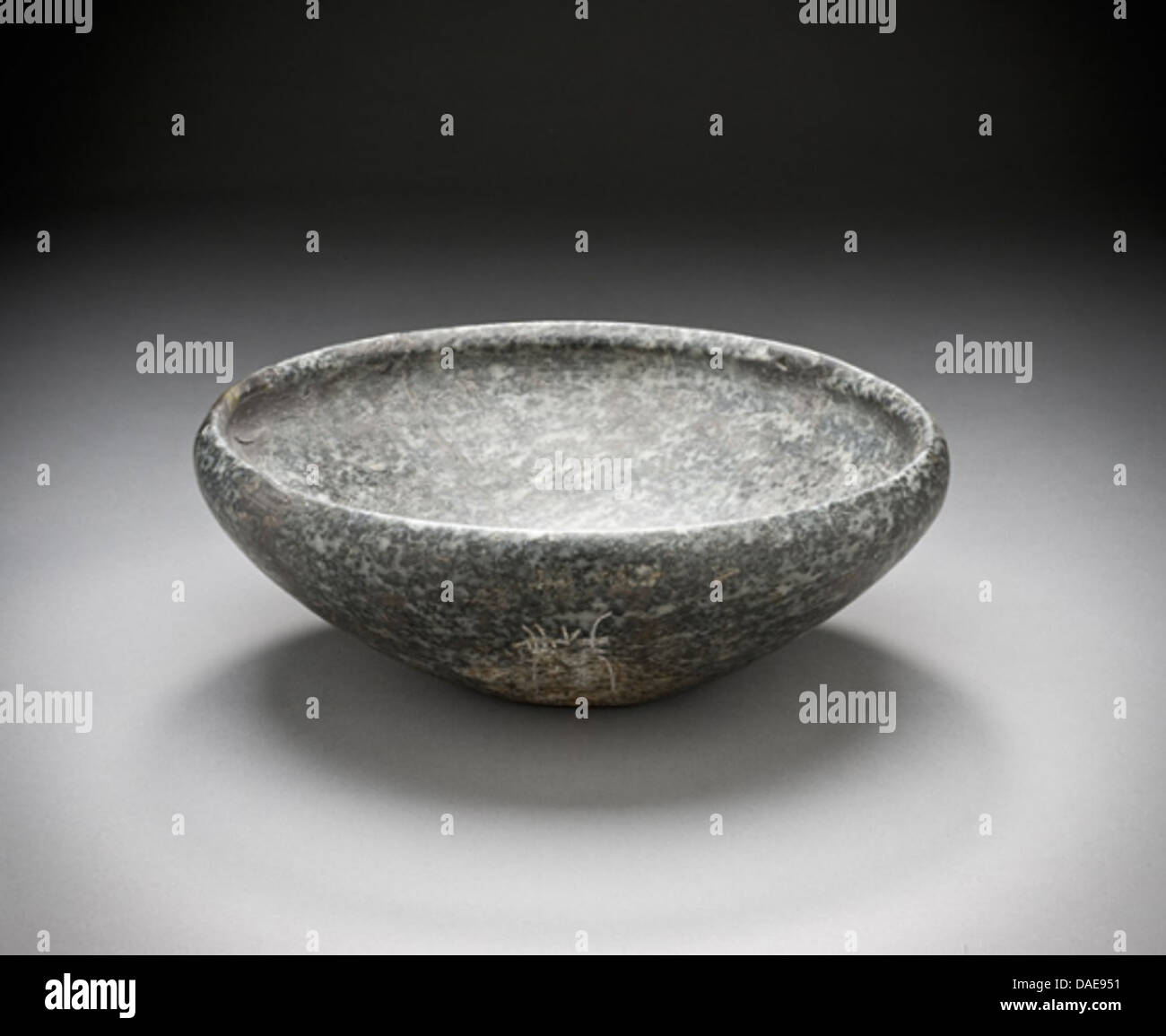This bowl, made of fine ceramic, showcases the artistry of ancient ...