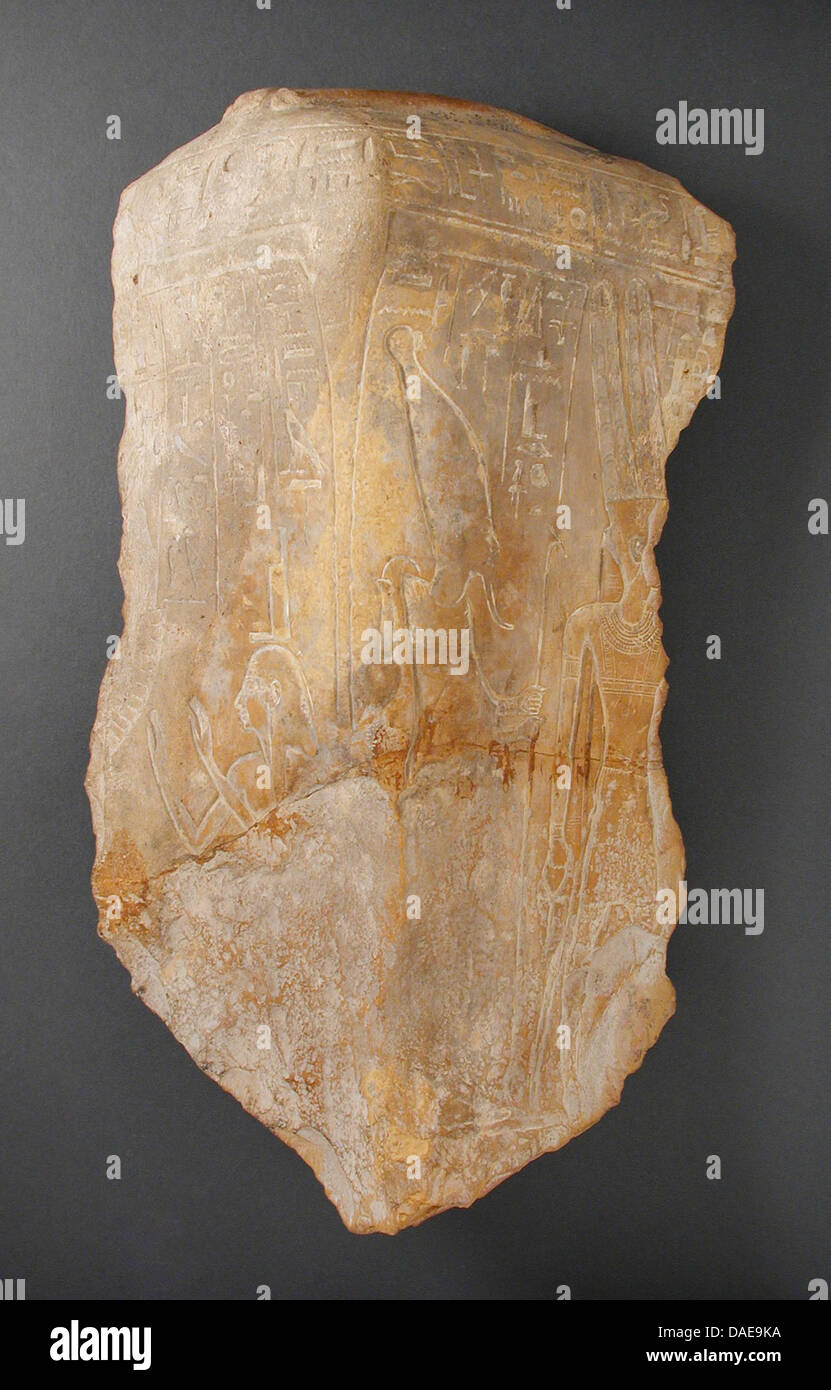 This corner fragment from a block statue of the Egyptian god Hor shows ...