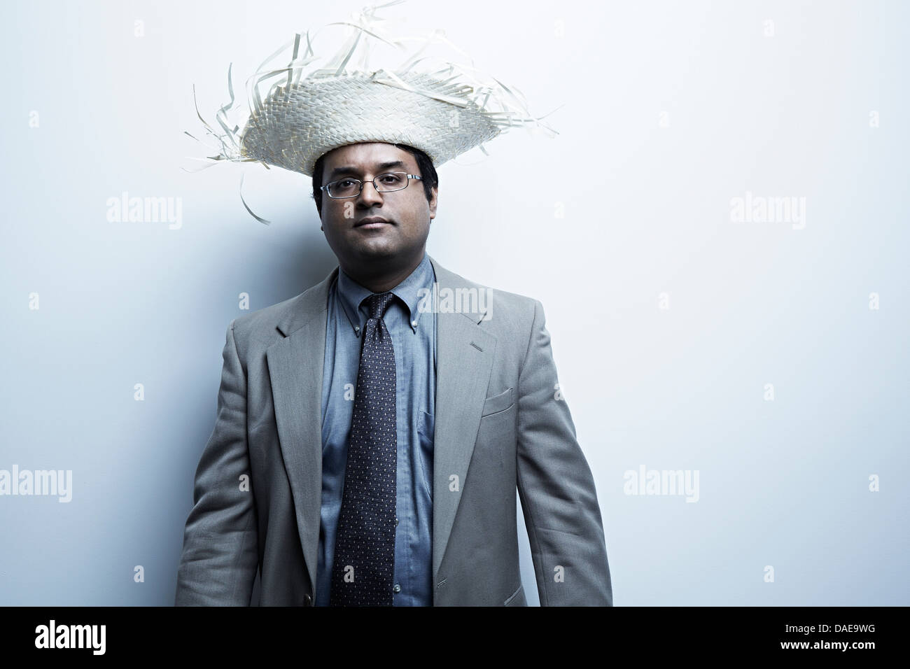 Young Man Wearing Straw Hat Stock Photos & Young Man Wearing Straw Hat ...