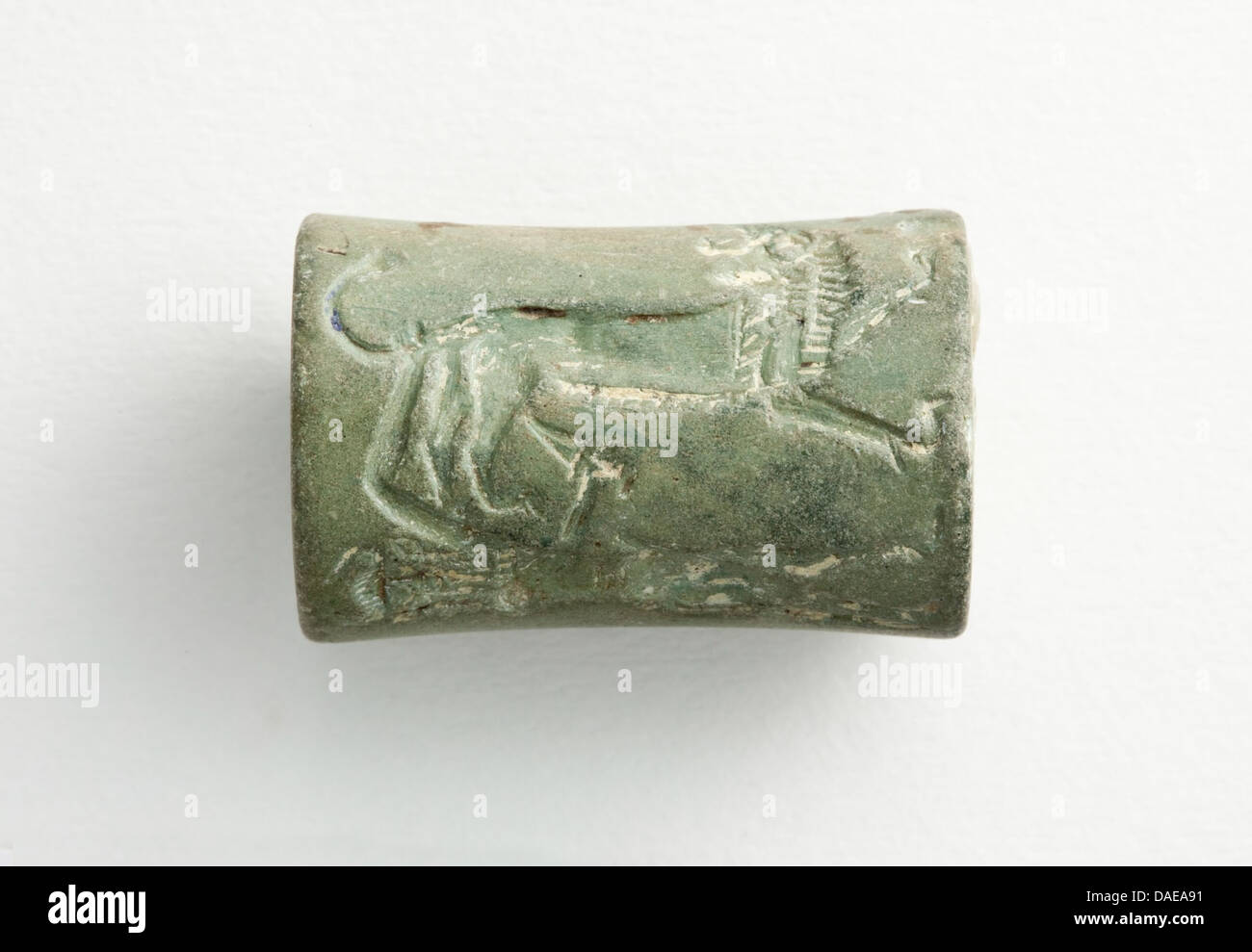 This cylinder seal, made of cast bronze, originates from the ancient ...