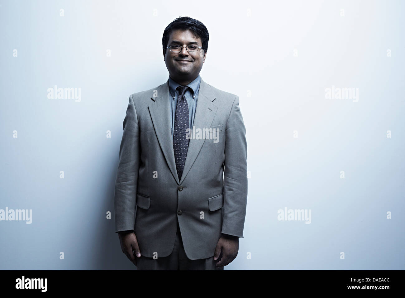 Good looking male in black suit hi-res stock photography and images - Alamy