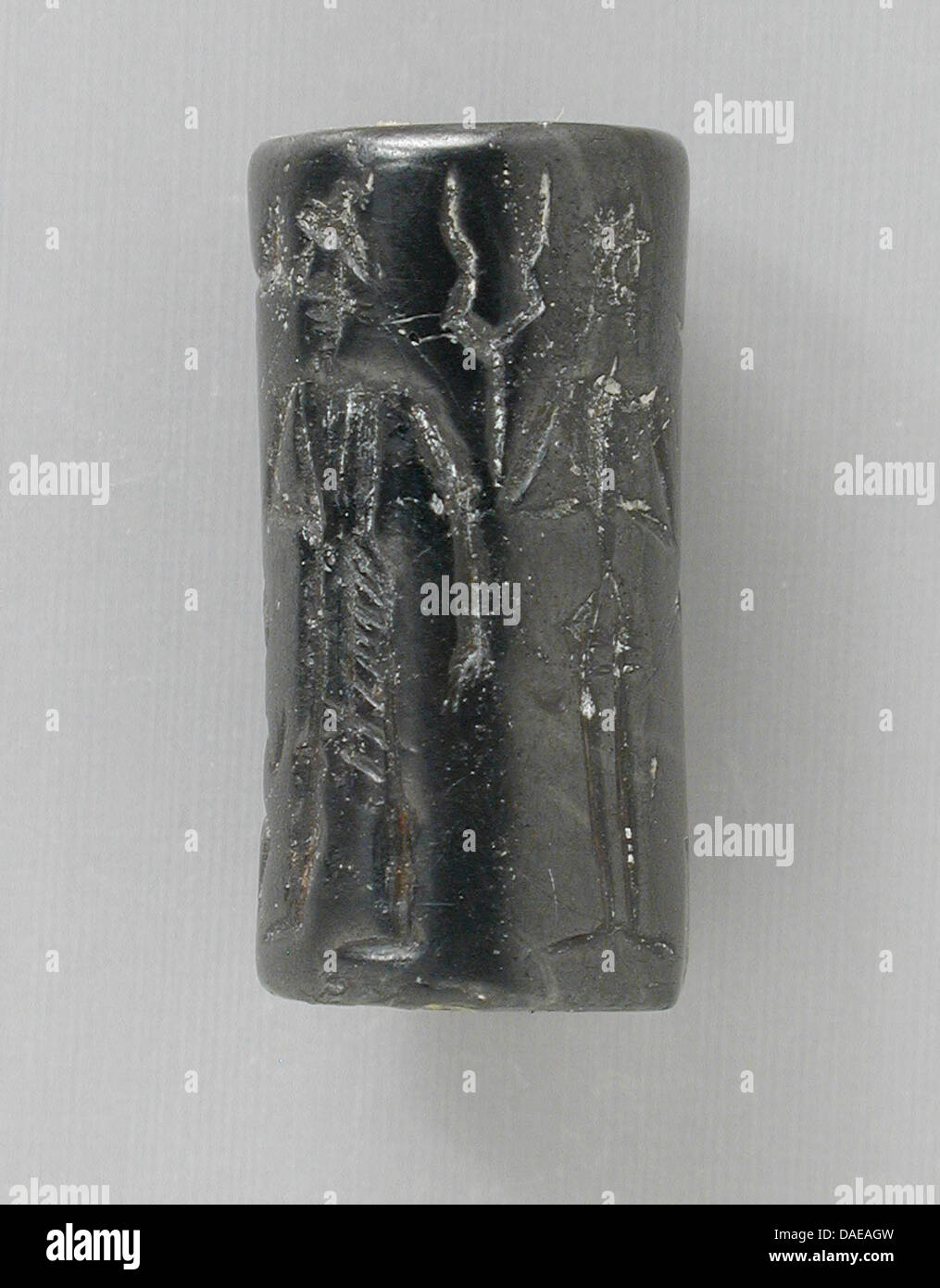 A cylinder seal from the ancient Near East, used to imprint designs on ...
