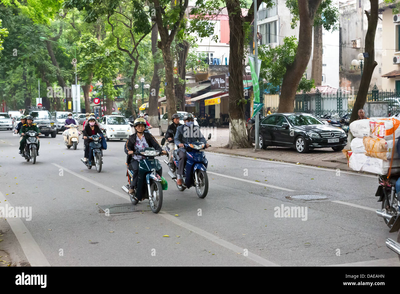 Scooter Drivers in Hanoi, Vietnam Stock Photo - Alamy