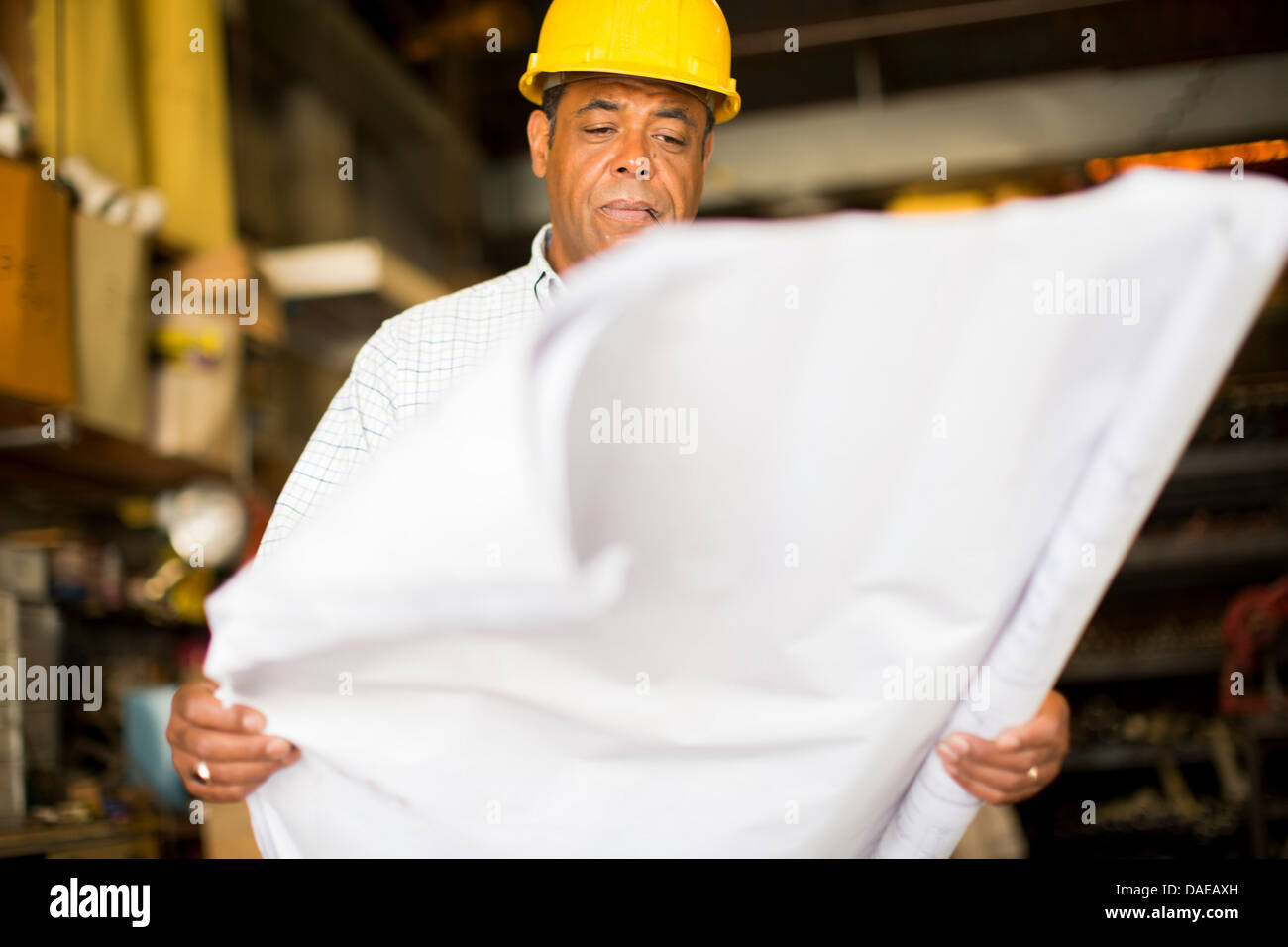 Man Holding Blueprint High Resolution Stock Photography and Images - Alamy