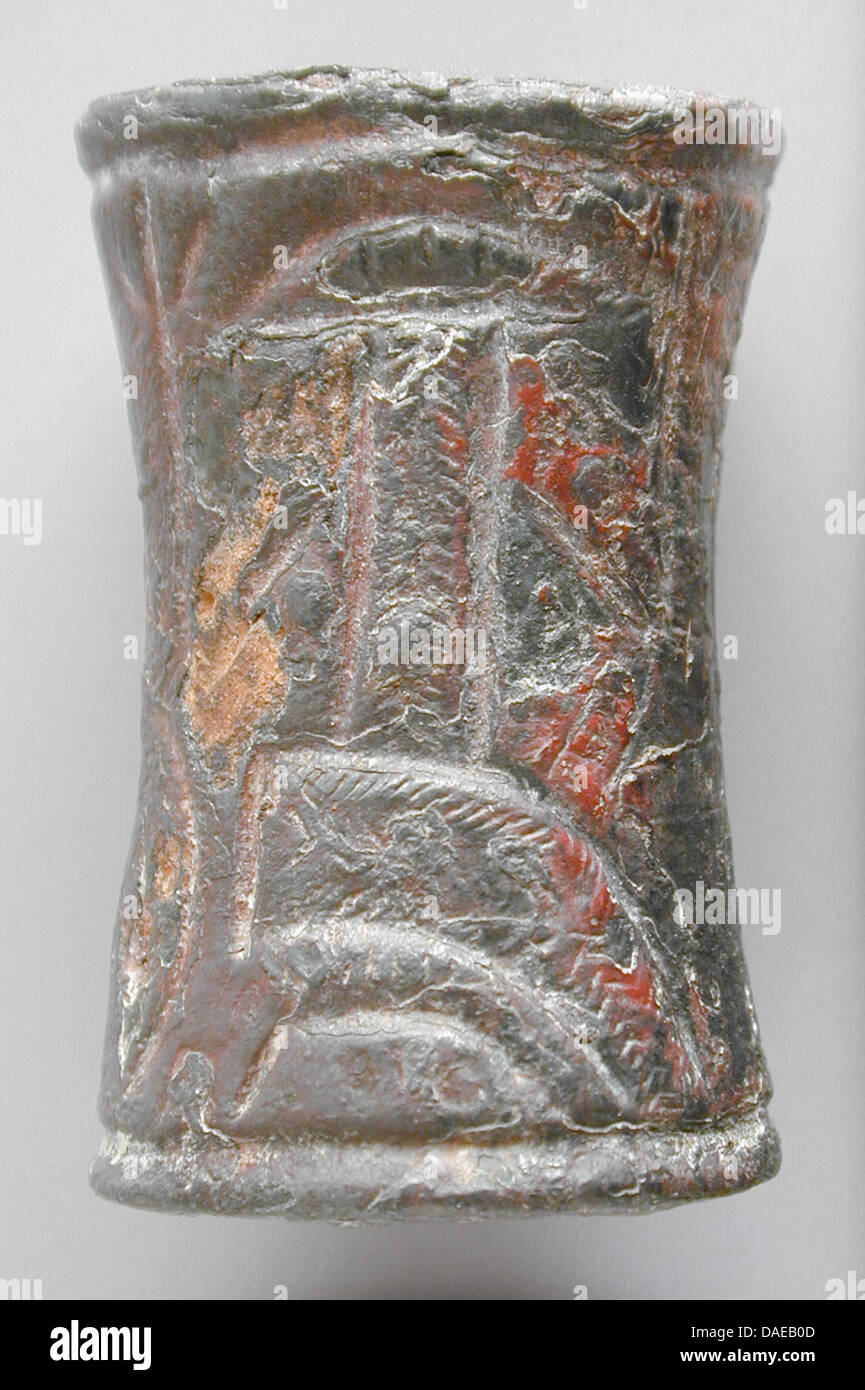 This cylinder seal, carved from stone, was used in ancient Mesopotamia ...