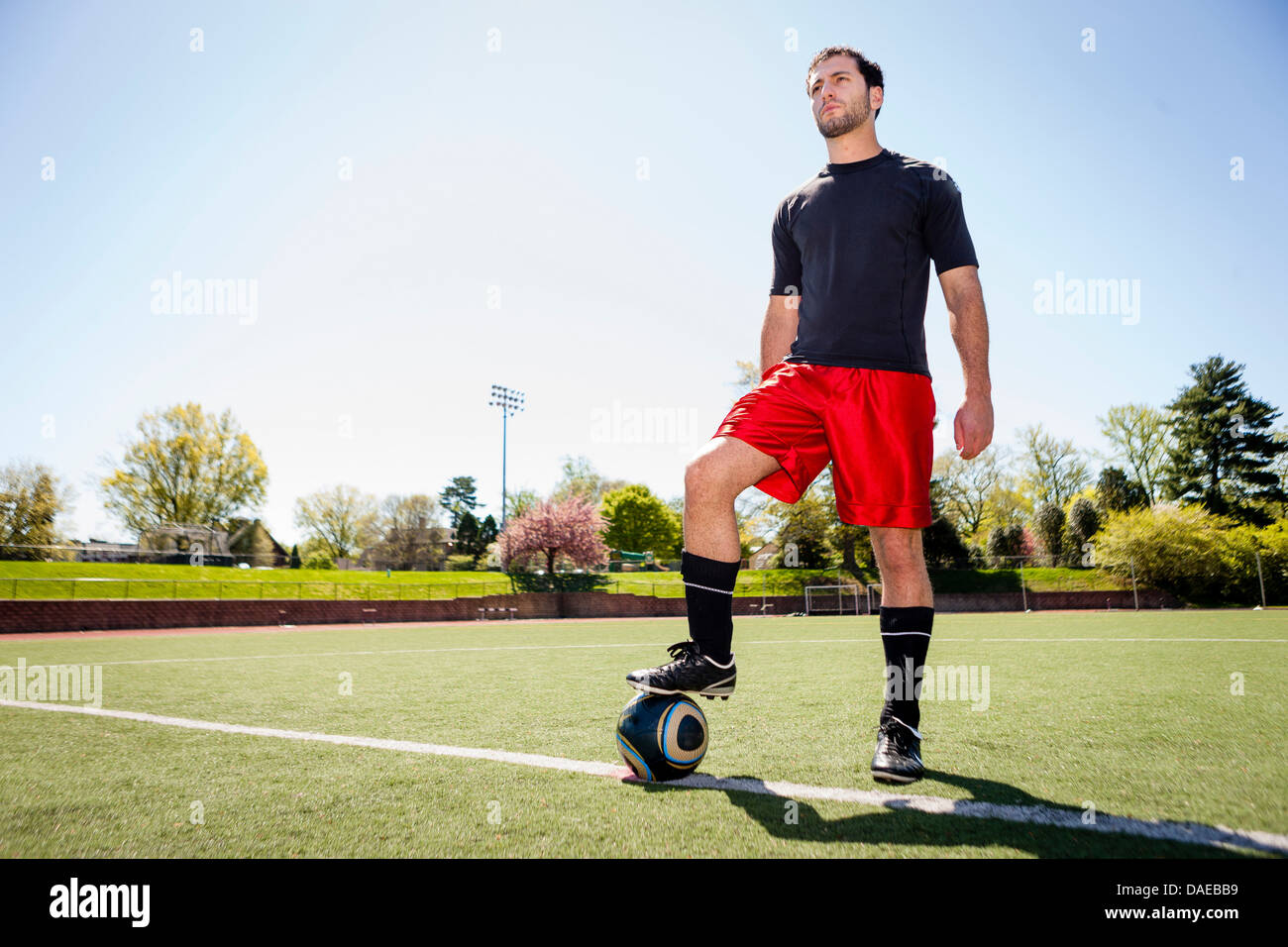 Soccer player preparing for free kick Stock Photo - Alamy
