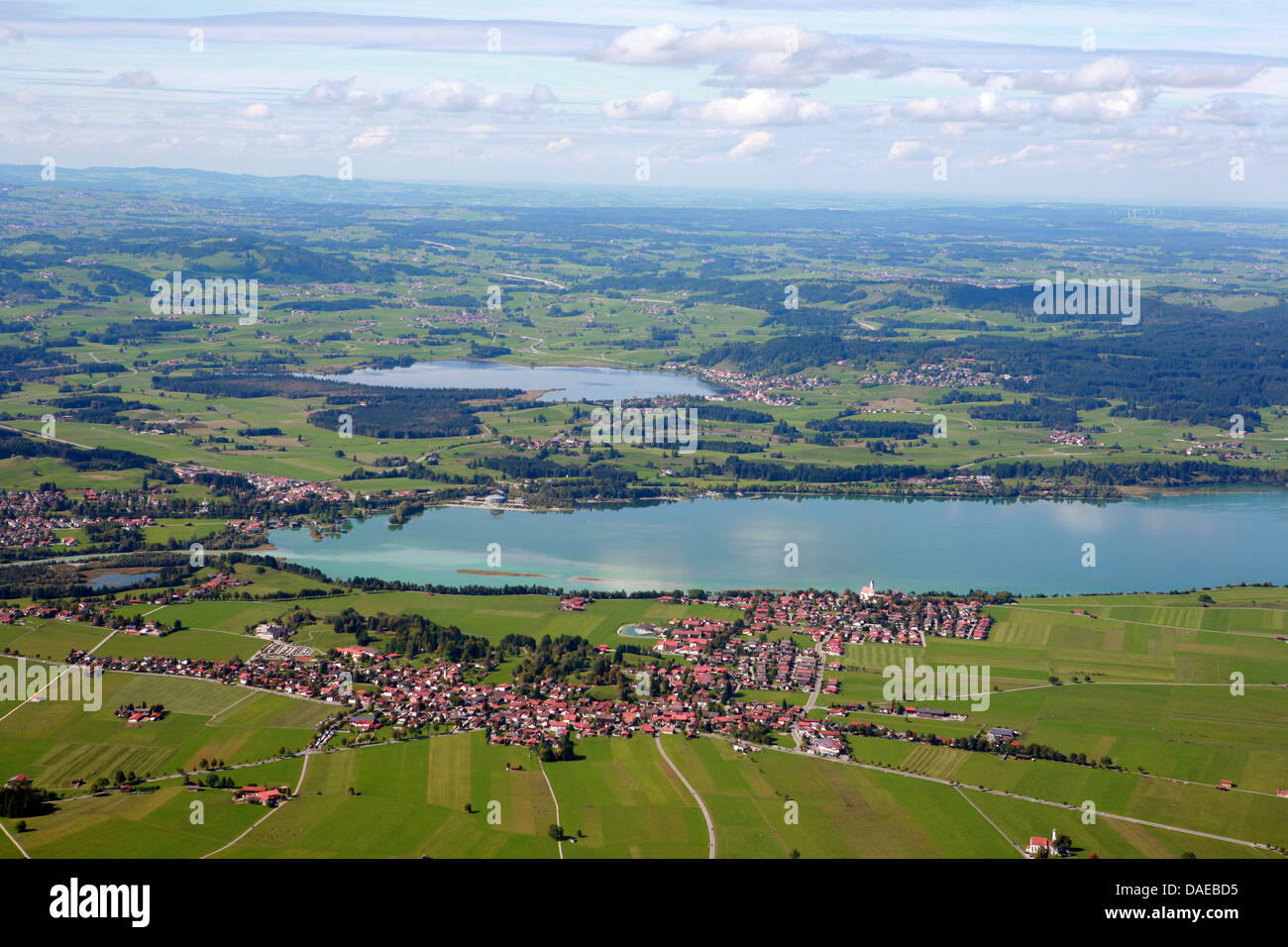 aerial view to Forggensee and Hopfelsee, Waltenhofen in foreground ...