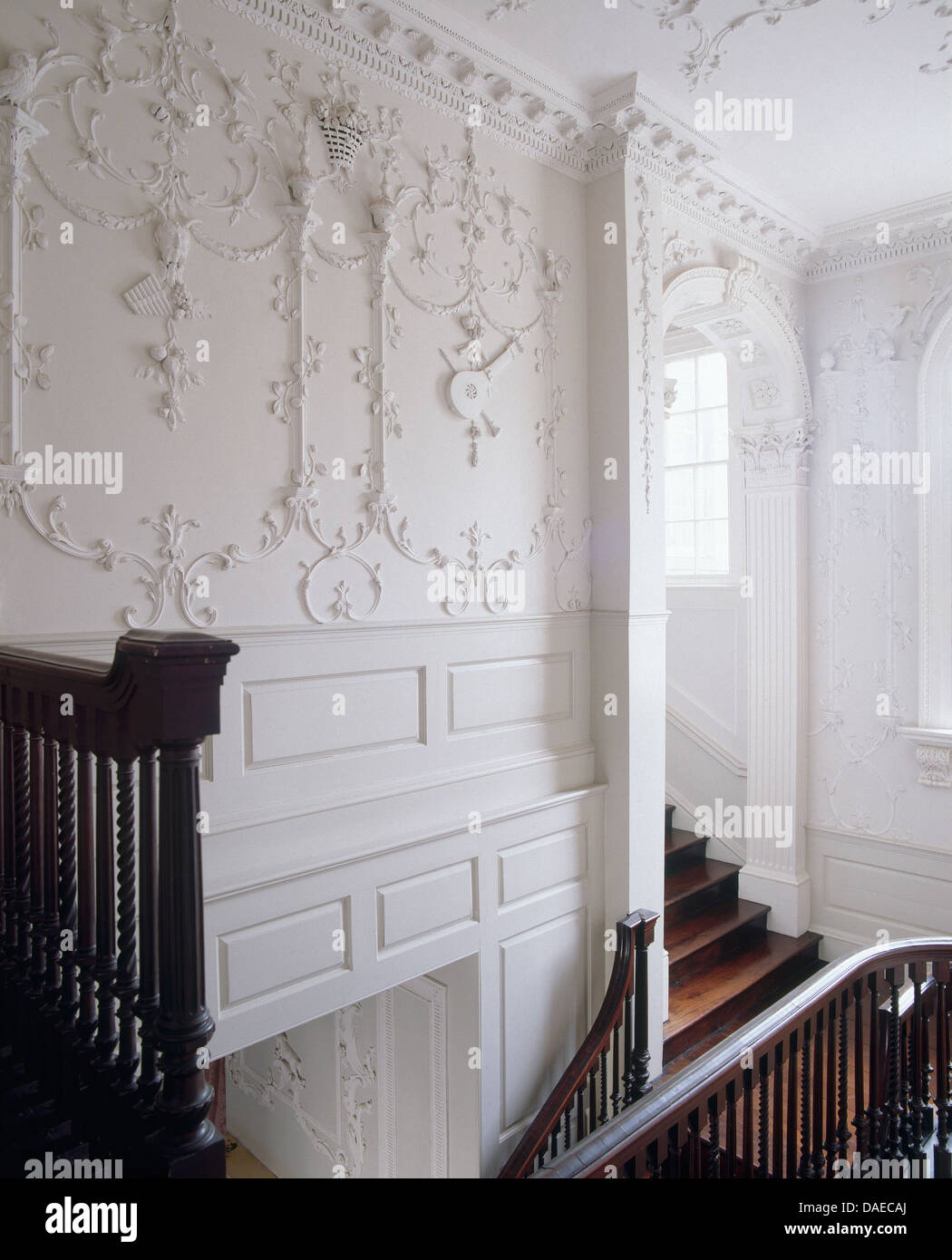 Grand hallway with ornate plasterwork on walls and ceiling Stock Photo ...