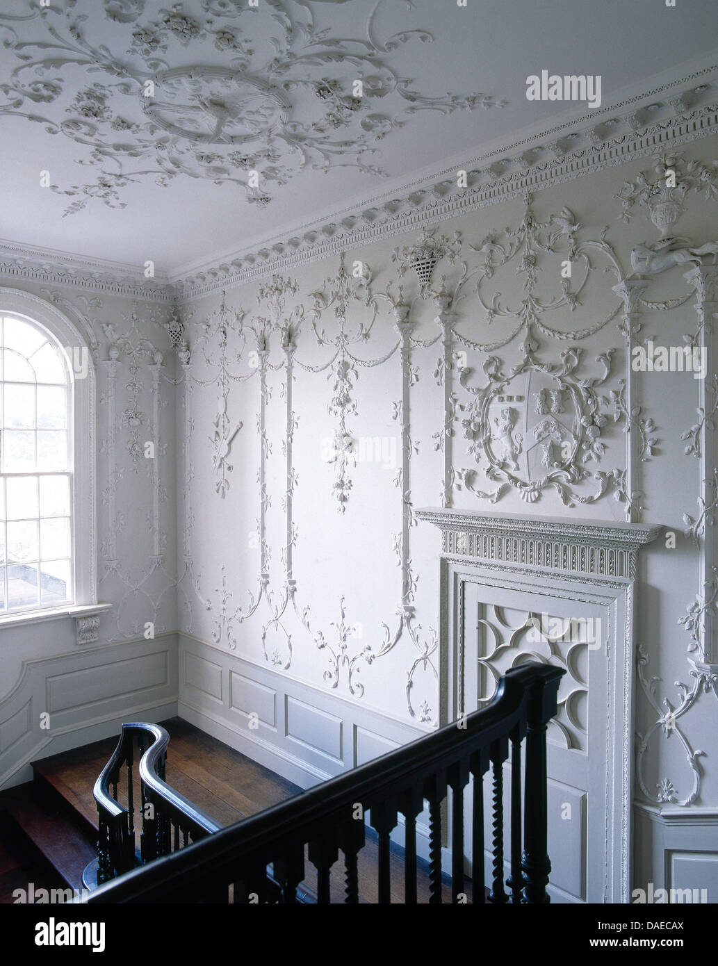 Grand landing with ornate plasterwork and oak staircase Stock Photo - Alamy