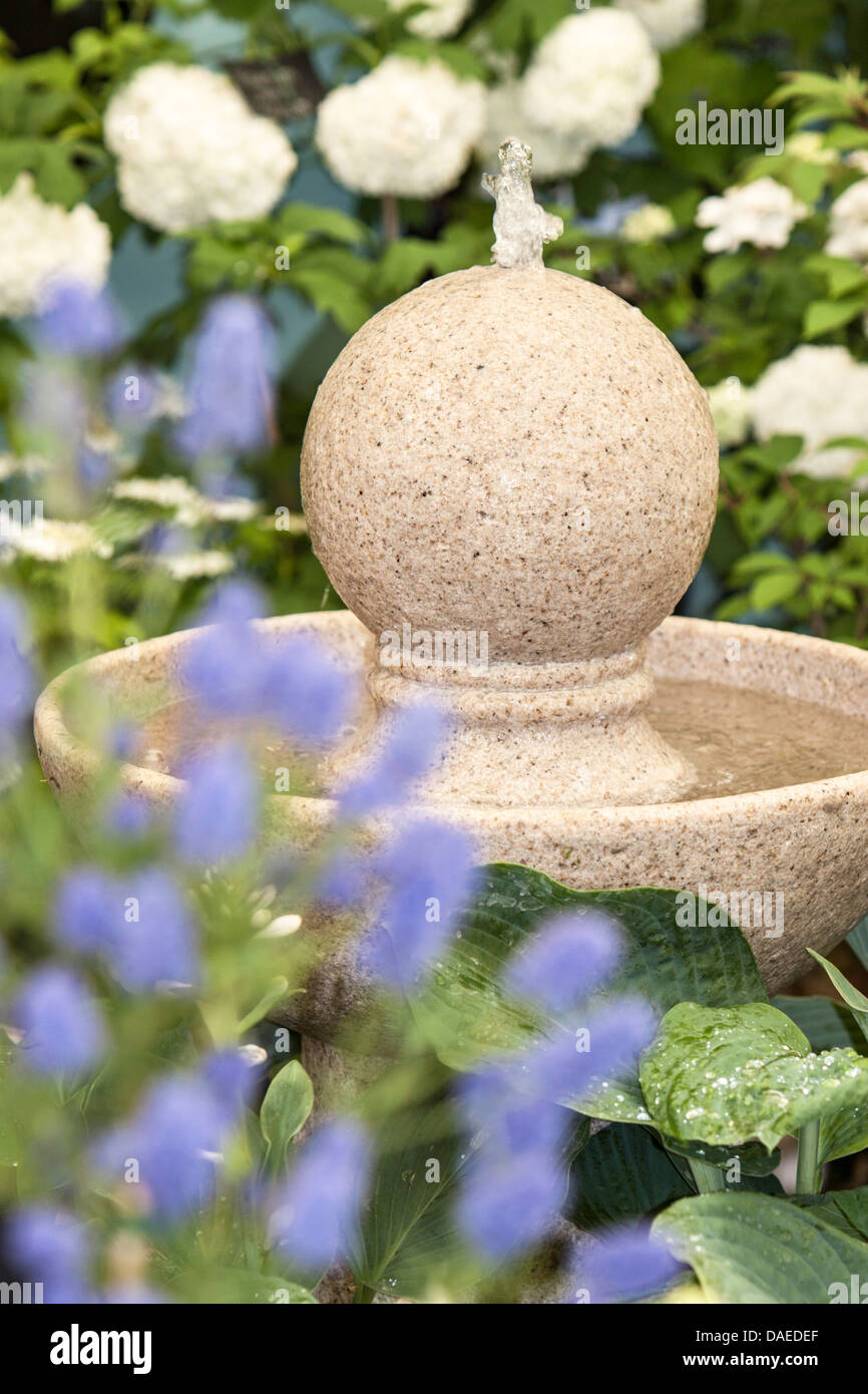 Ornamental stone ball water feature, England, UK Stock Photo - Alamy