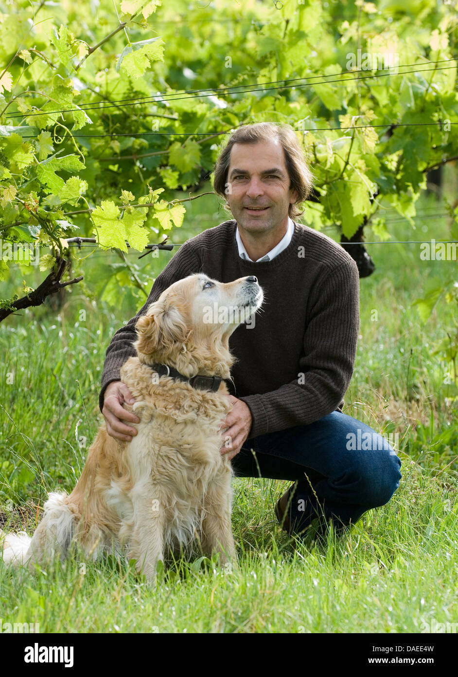Portrait of man with golden Retriever dog Stock Photo - Alamy
