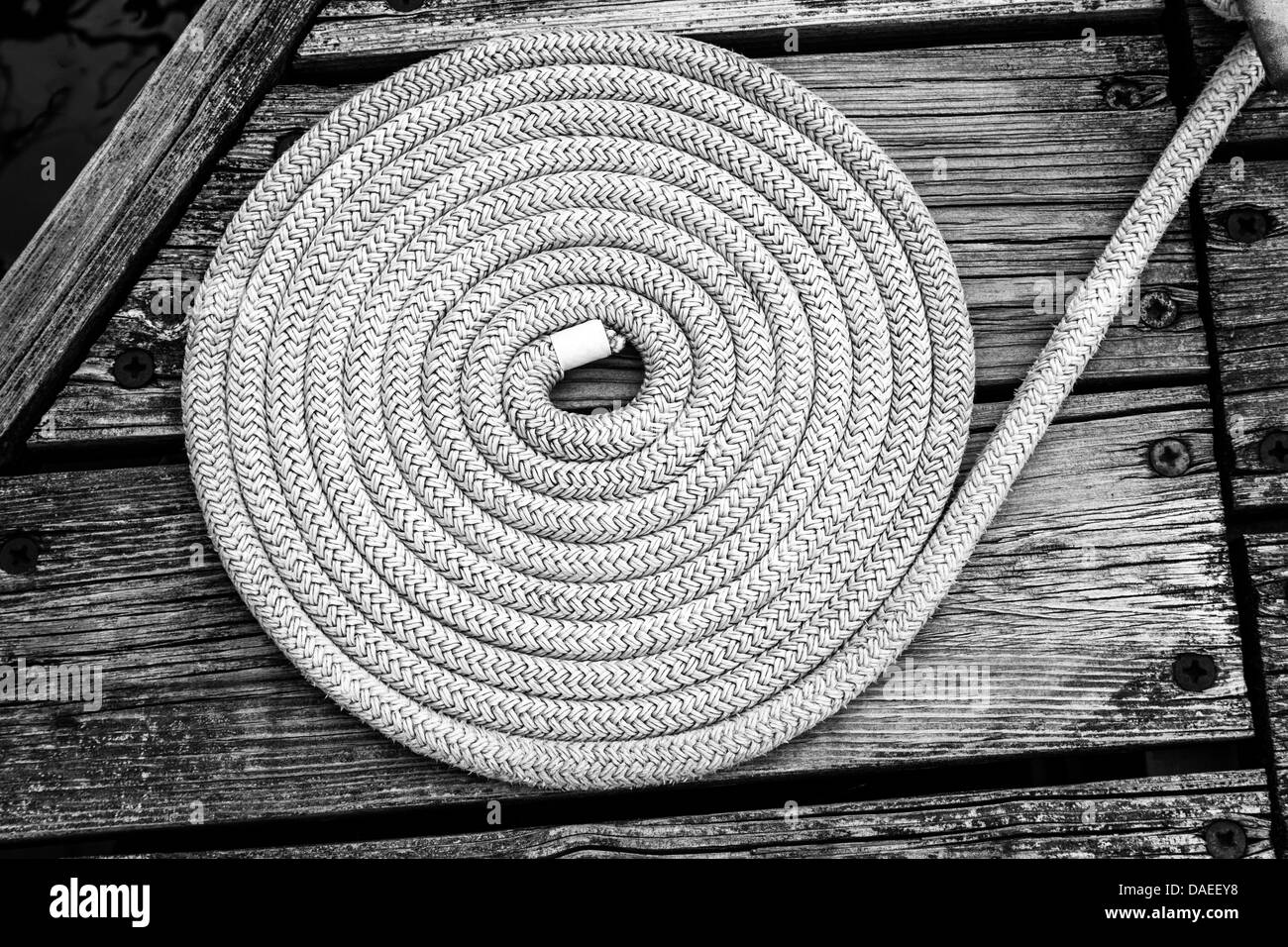 Coil of nylon rope on a pier Stock Photo - Alamy