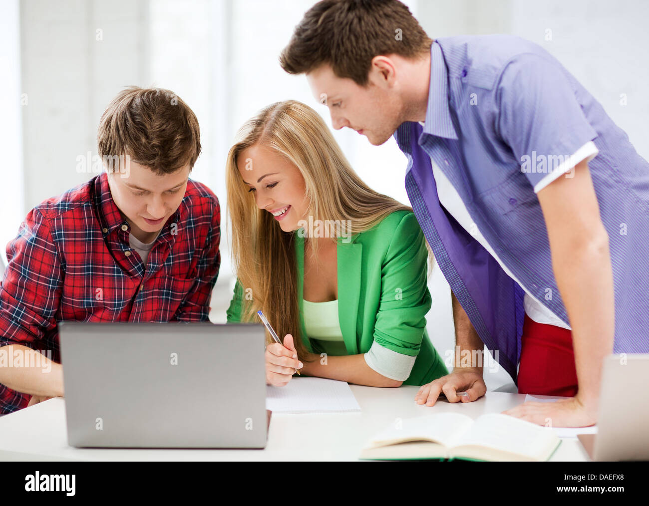 students writing test or exam in lecture at school Stock Photo - Alamy