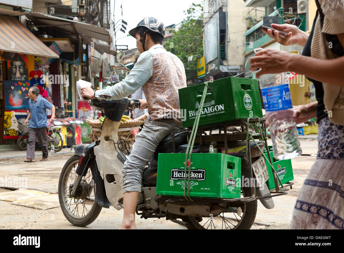 Scooter Drivers in Hanoi, Vietnam Stock Photo - Alamy