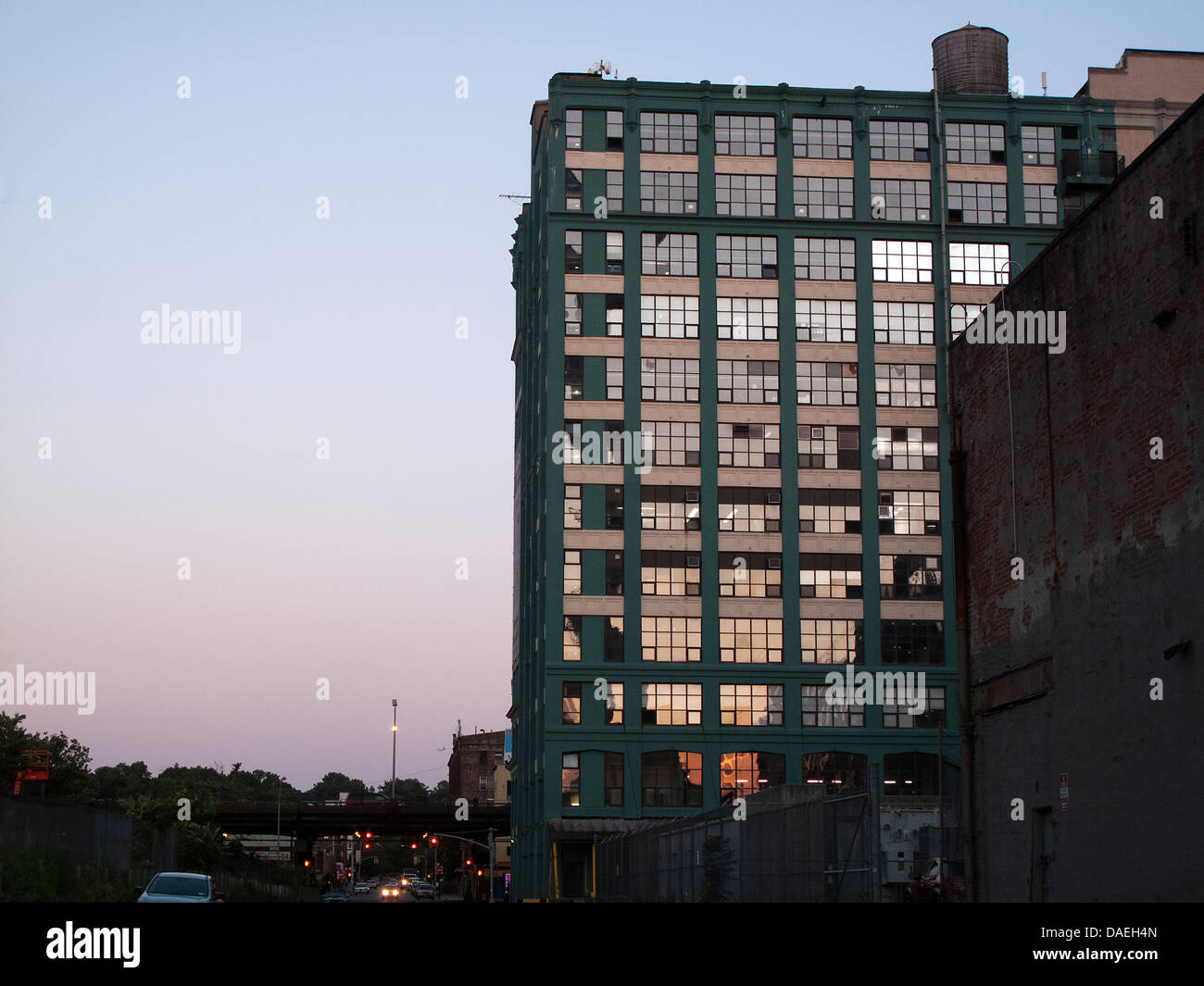 A green building blocks the sunset Stock Photo - Alamy