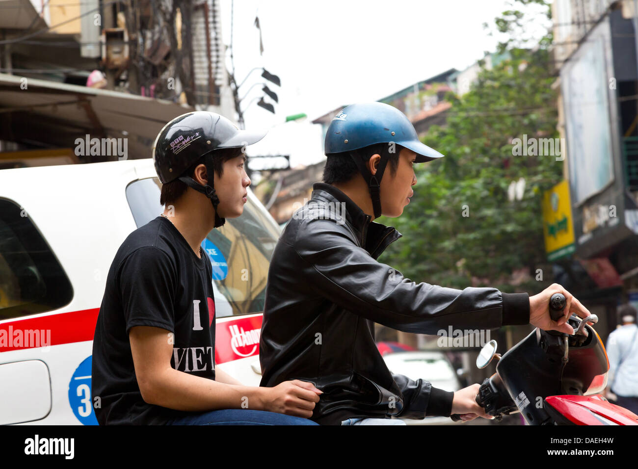 Scooter Drivers in Hanoi, Vietnam Stock Photo - Alamy