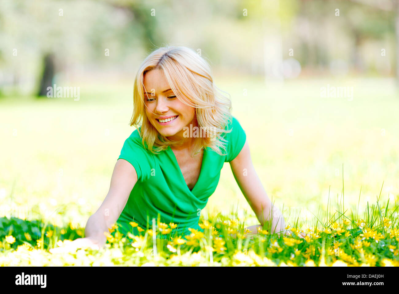 Beautiful young woman enjoy spring nature Stock Photo - Alamy