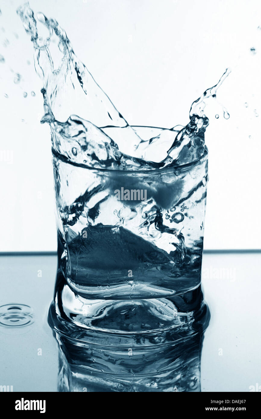 vodka alcohol elegant splash bar background Stock Photo - Alamy