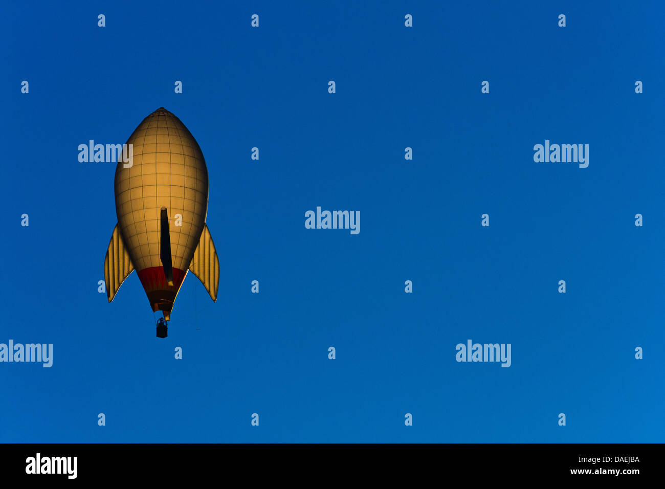 Spaceship hot air balloon against clear blue sky at sunrise at Spirit ...