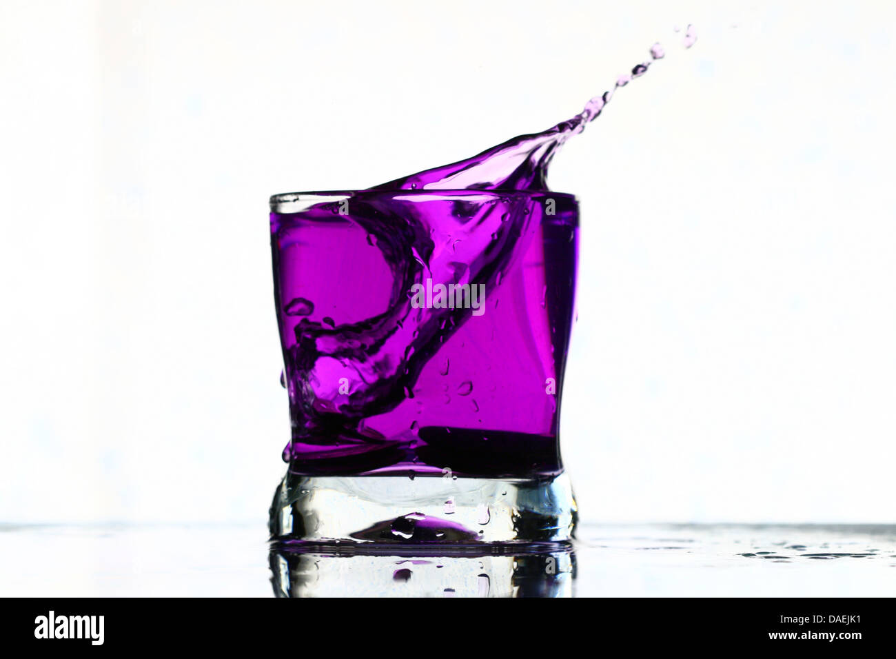 coctail drink splash isolated on white Stock Photo - Alamy