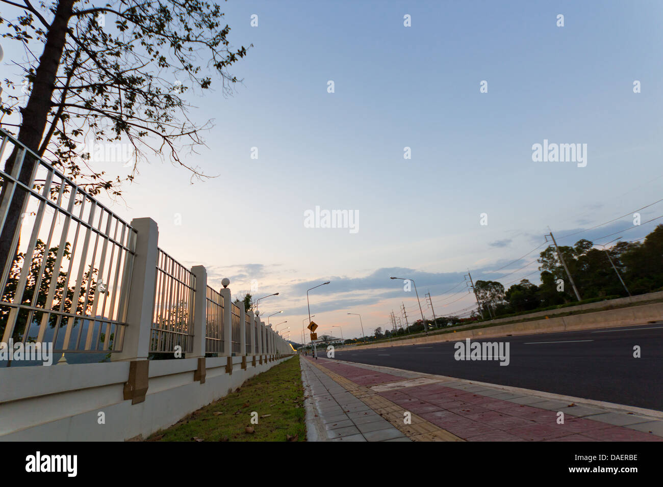 Long and Distant Road with Twilight Sky Background Stock Photo - Alamy