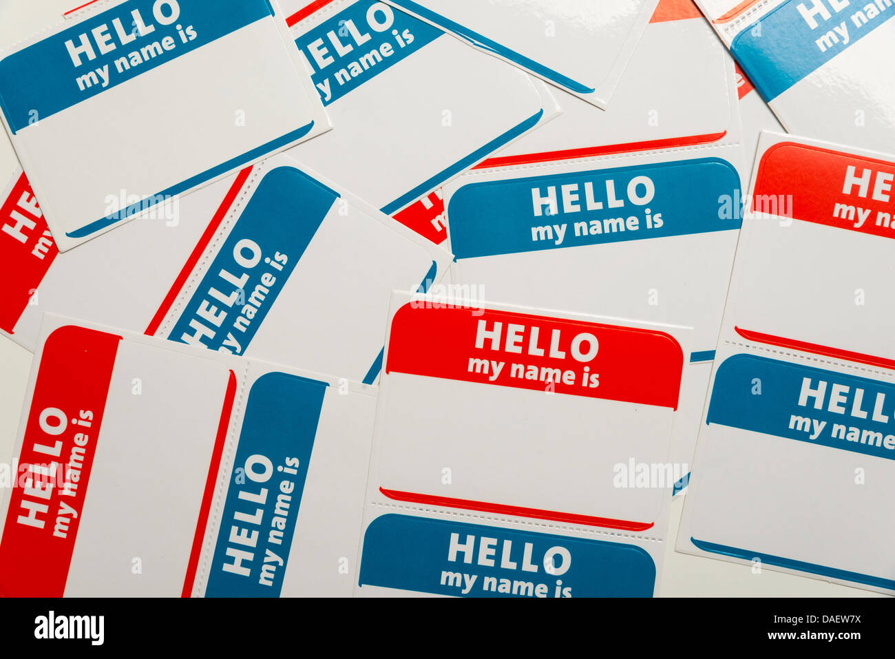A stack of blue and red "Hello, my name is" name tags or badges Stock ...