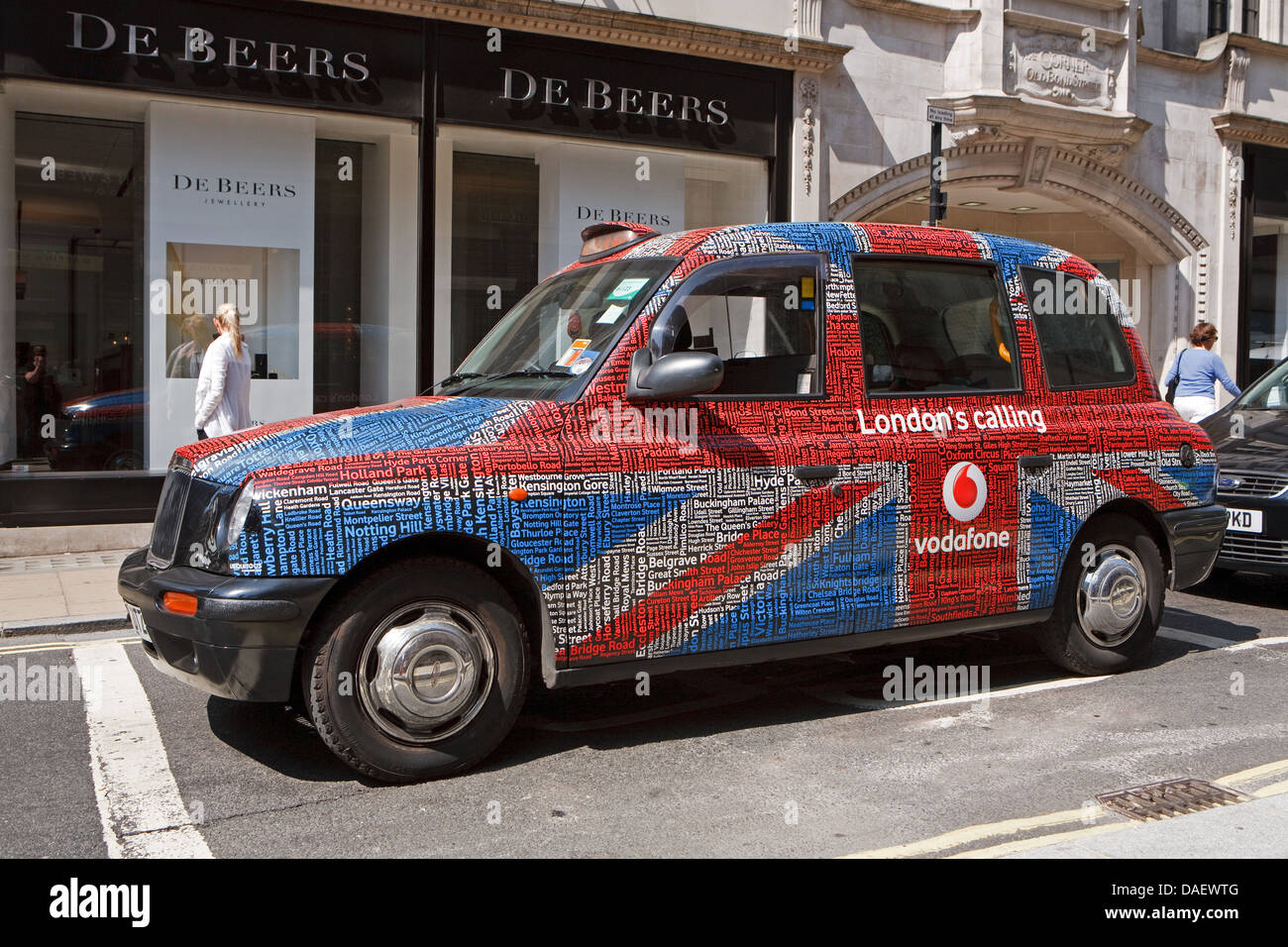 A london taxi with a union jack design Stock Photo - Alamy
