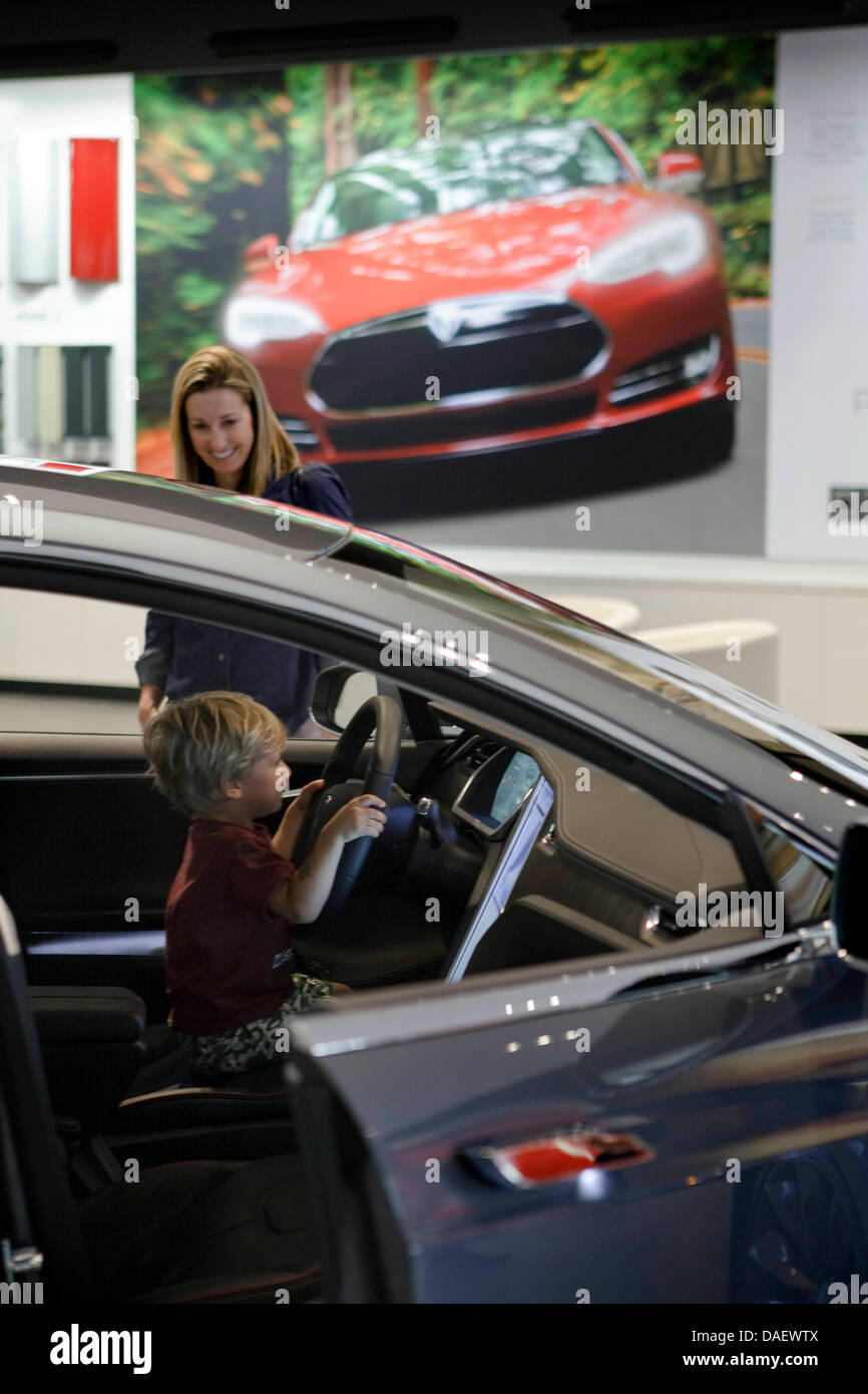 July 11, 2013 - San Jose, California, U.S. - A young boy behind the ...