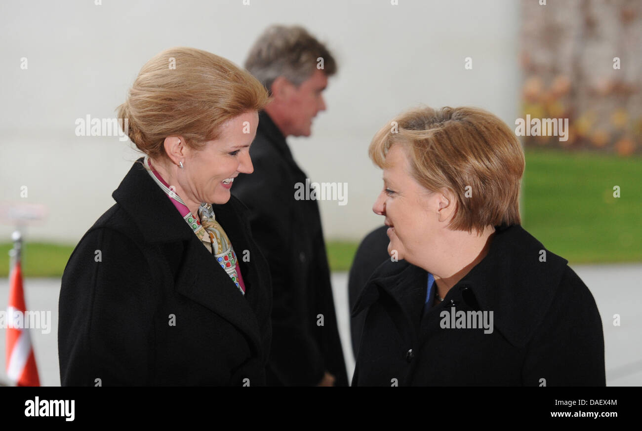 German Chancellor Angela Merkel (R) welcomes Danish Prime Minister ...