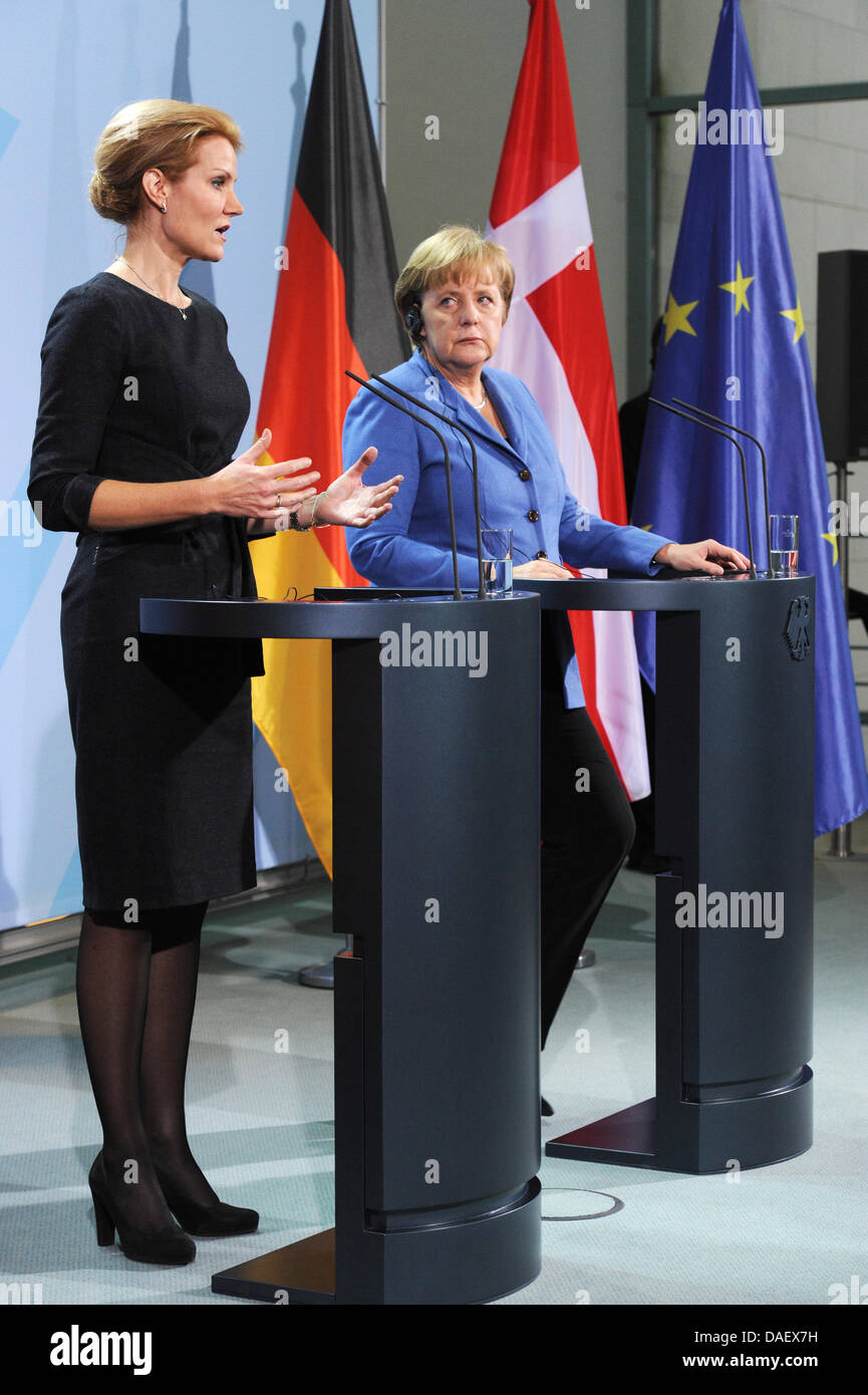 German Chancellor Angela Merkel (R) and Danish Prime Minister Helle ...