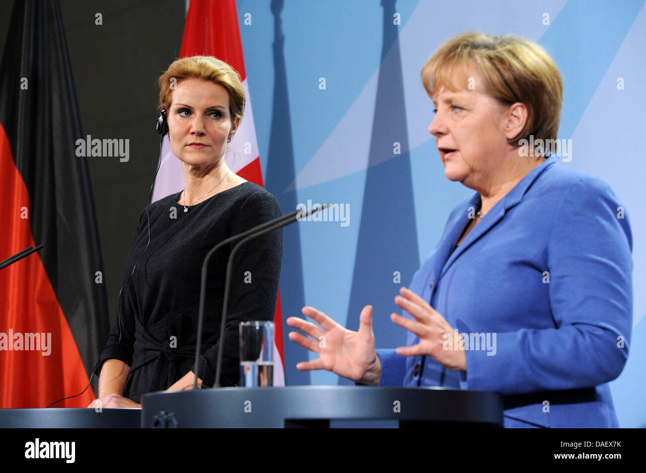 German Chancellor Angela Merkel (R) and Danish Prime Minister Helle ...