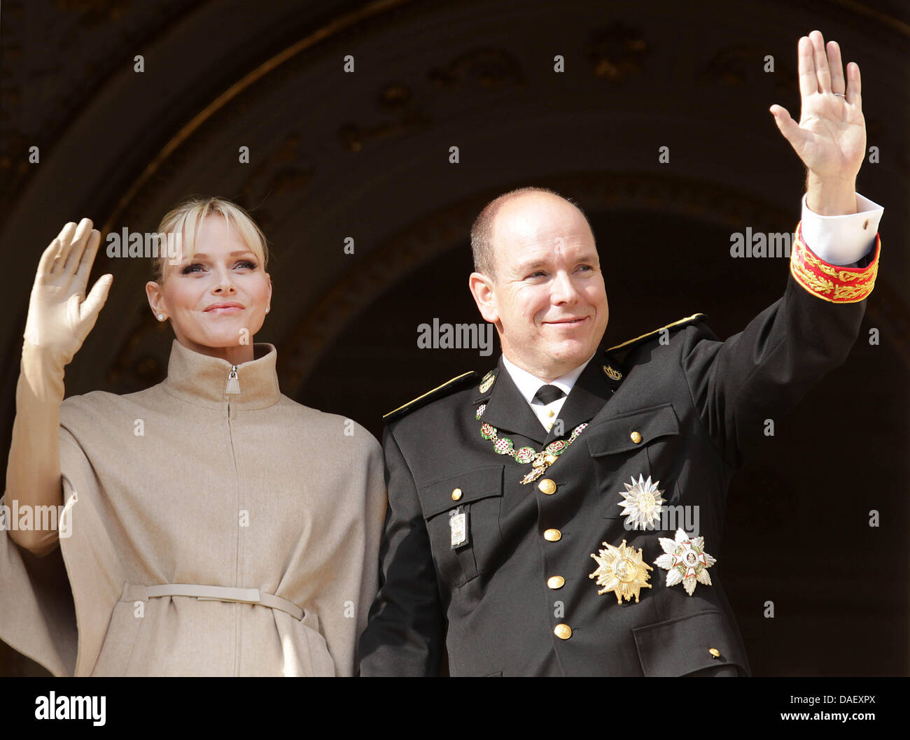 Prince Albert II of Monaco and his wife Princess Charlene greet from ...