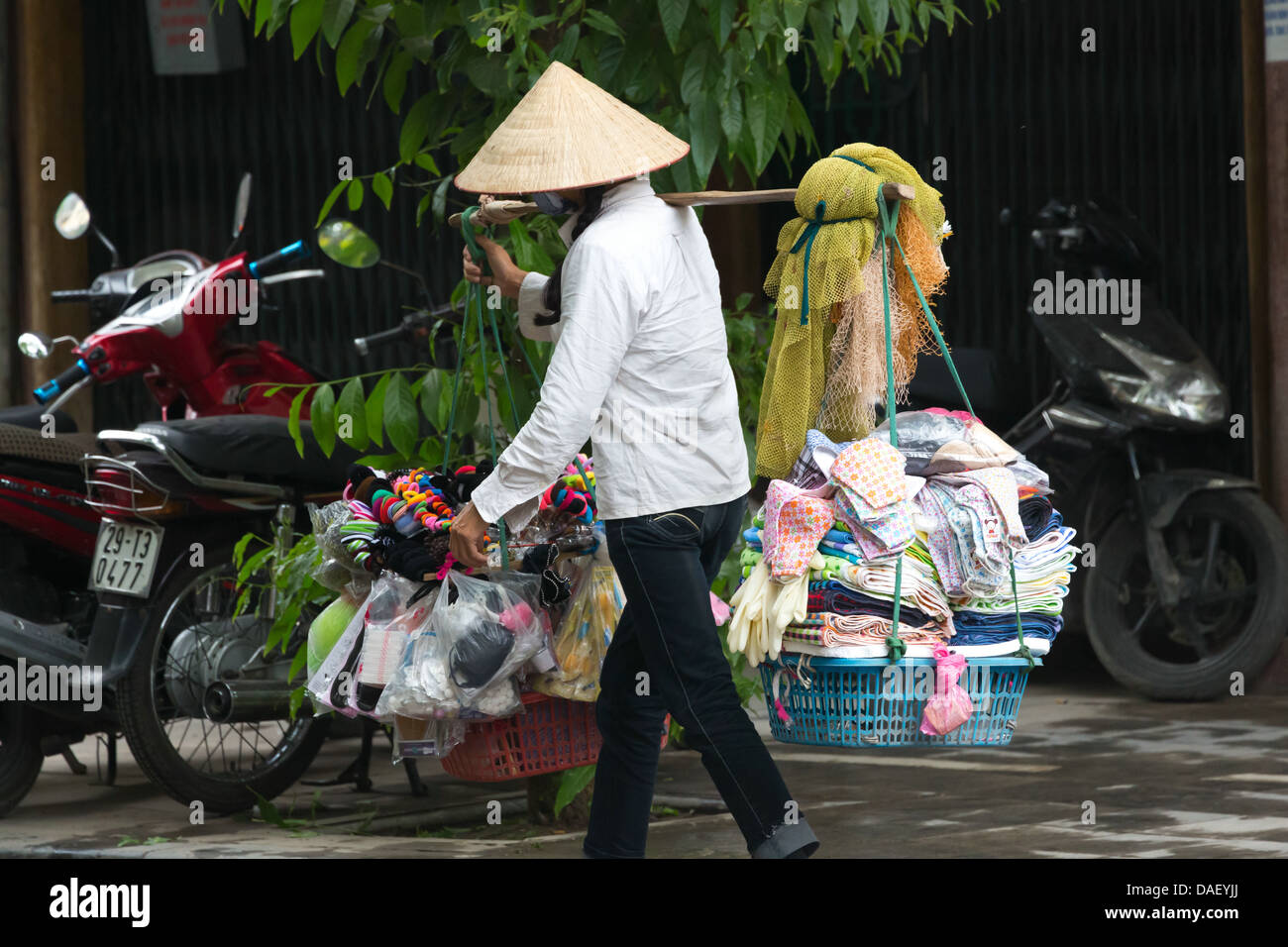 Typical Street Vendor in the Streets of Hanoi, Vietnam Stock Photo - Alamy