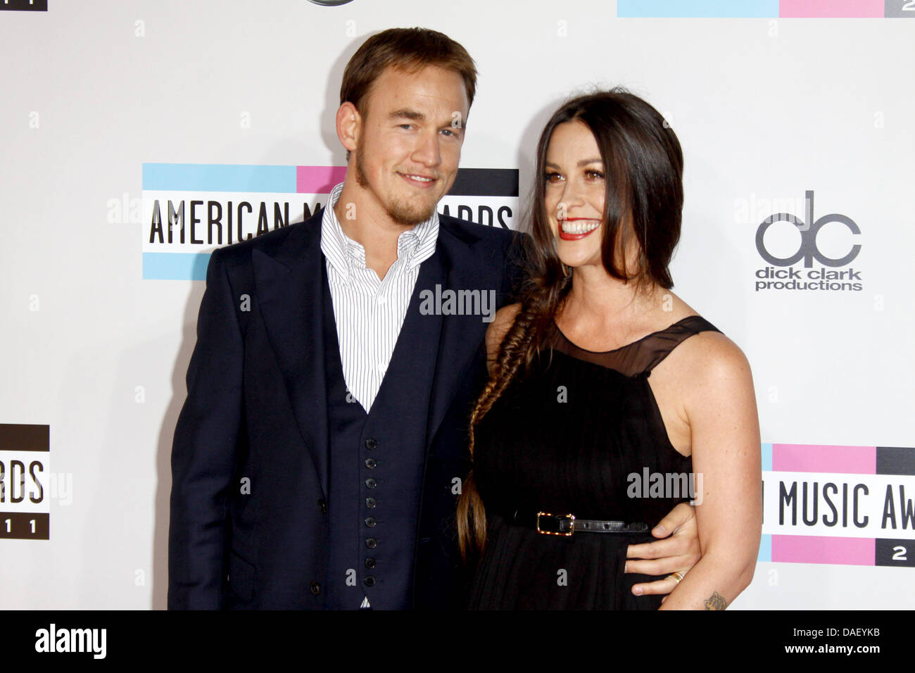 Singer Alanis Morisette and Mario ÒMC SouleyeÓ Treadway arrive at the ...