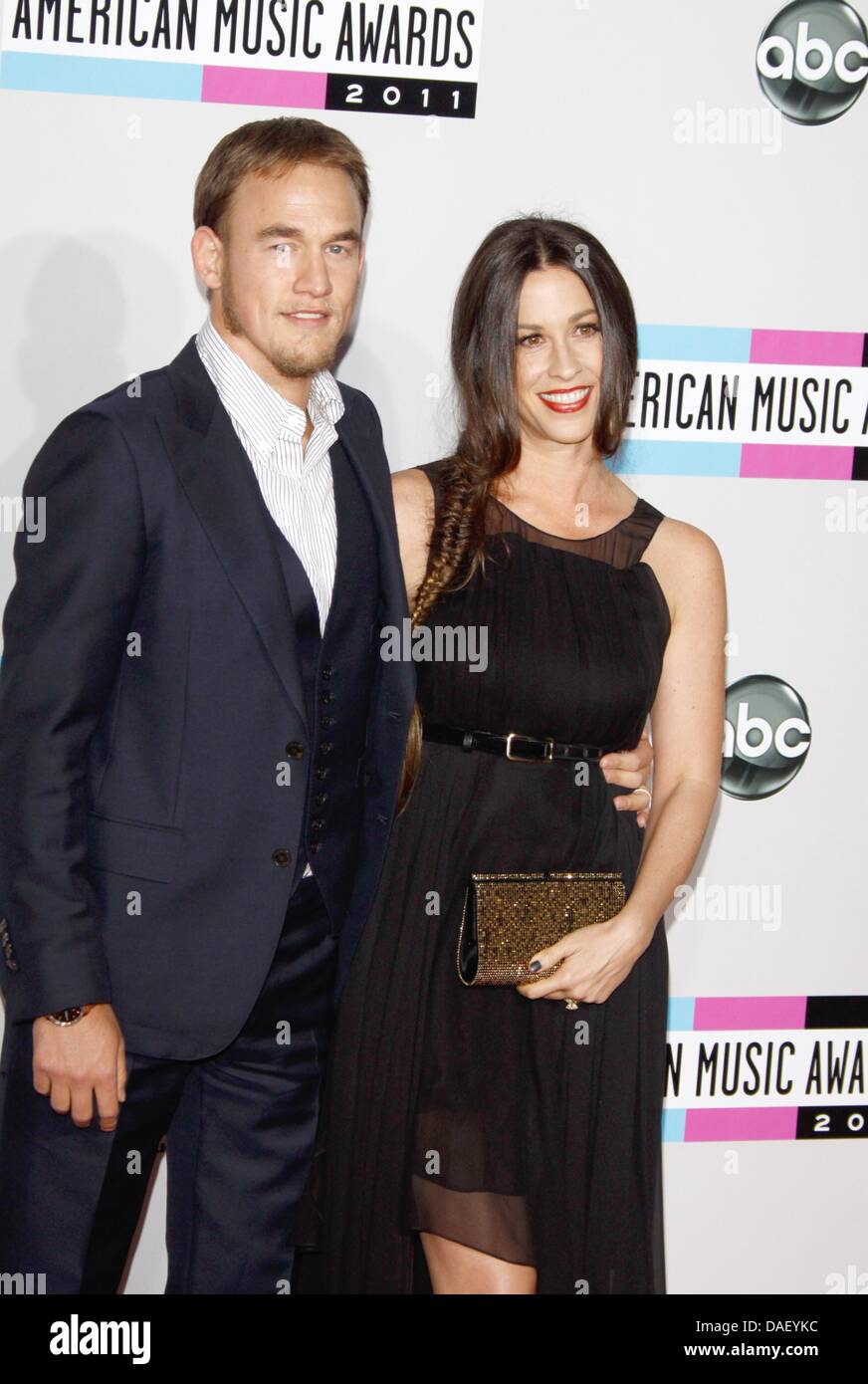 Singer Alanis Morisette and Mario ÒMC SouleyeÓ Treadway arrive at the ...