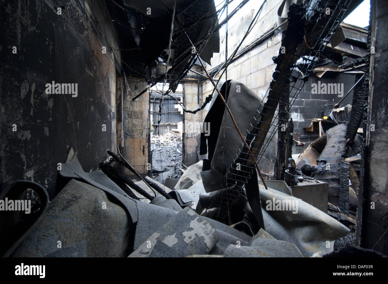 The charred remains of the classrooms and its teaching equipment are ...