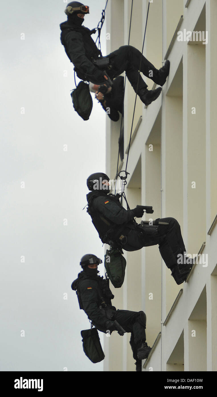 (FILE) - A file picture dated 19 June 2010 shows three members of the ...